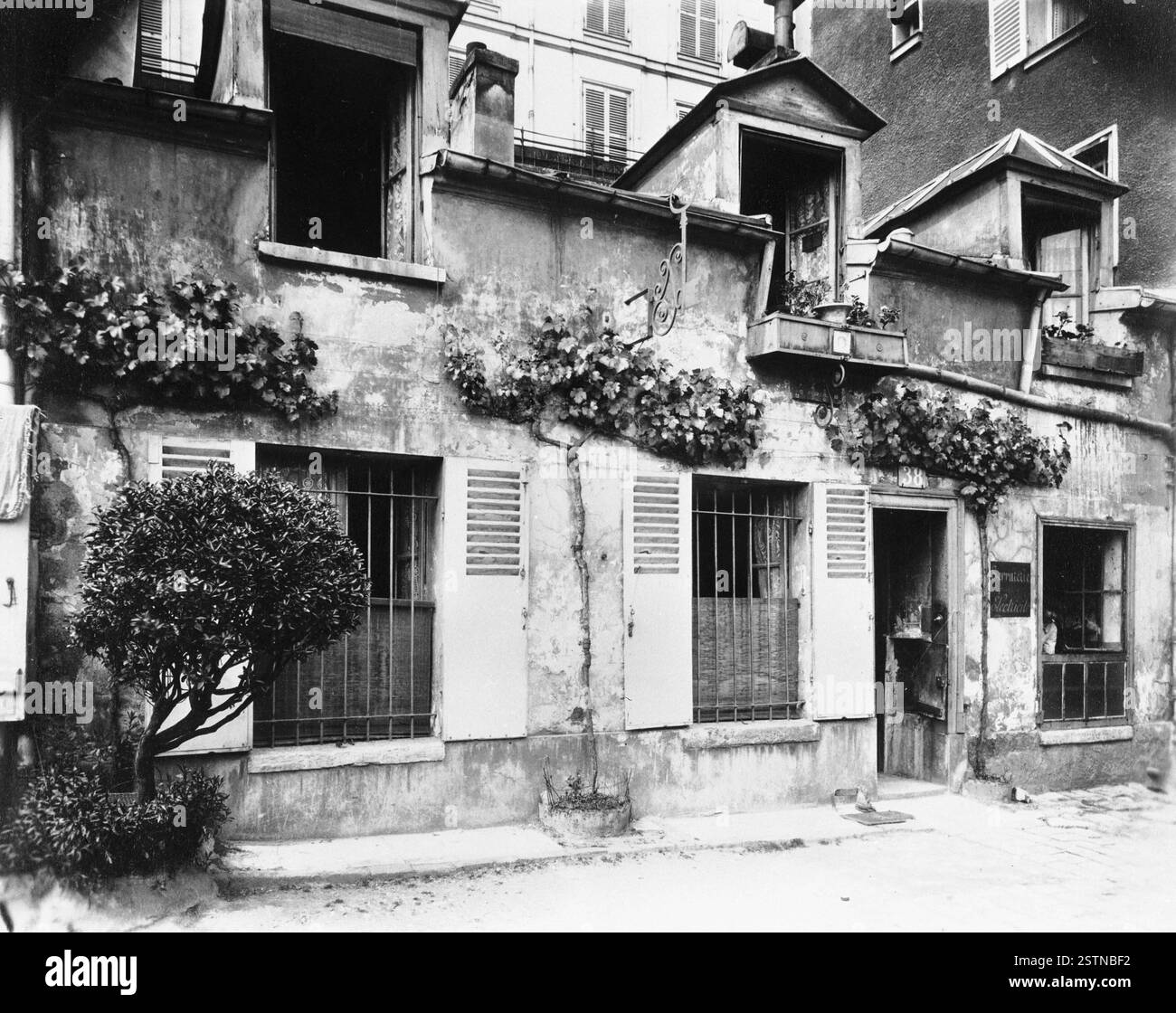 A photograph by Eugène Atget from his 'Topography' series, capturing ...
