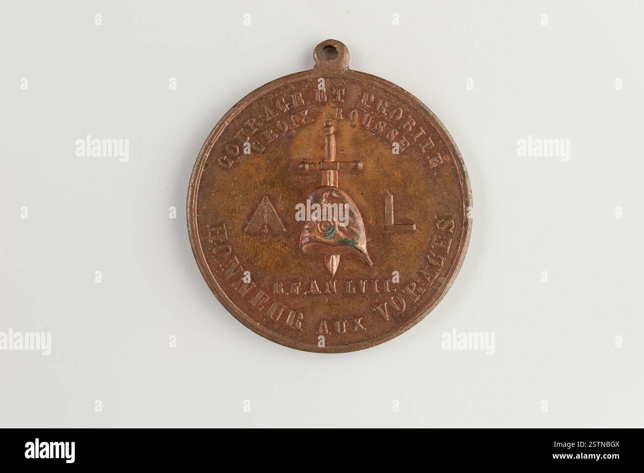 A medallion attributed to Ikeda Eisen, created in 1848, featuring a ...