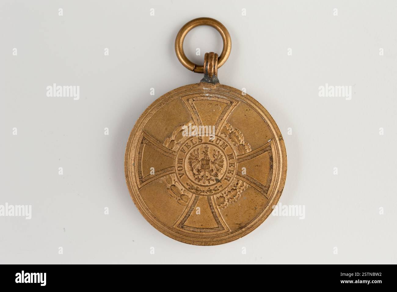 1849 medal featuring a radiant Iron Cross with a Prussian eagle at its ...