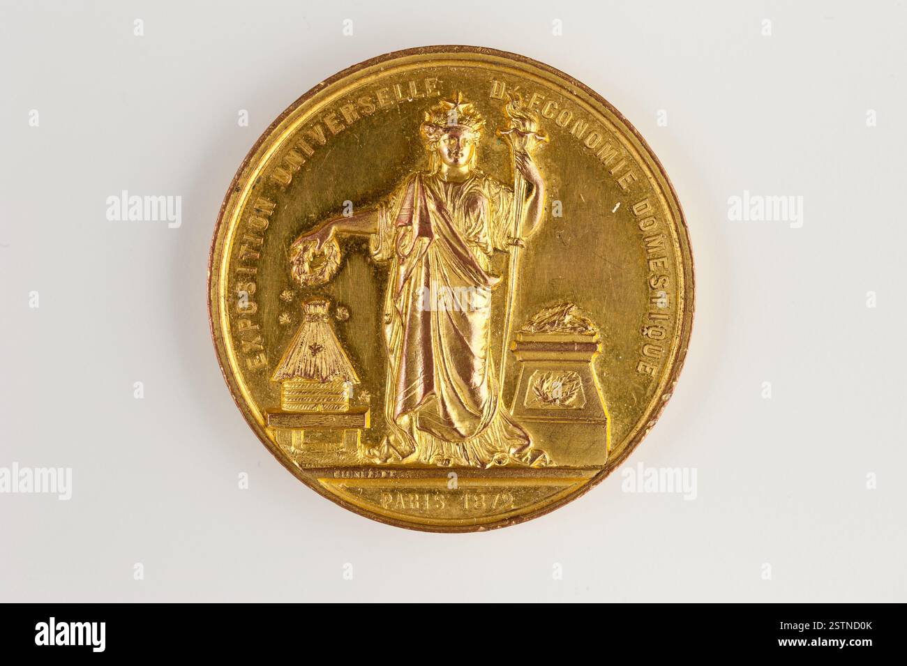 This 1872 medal by Gatteaux depicts the figure of the Republic holding ...