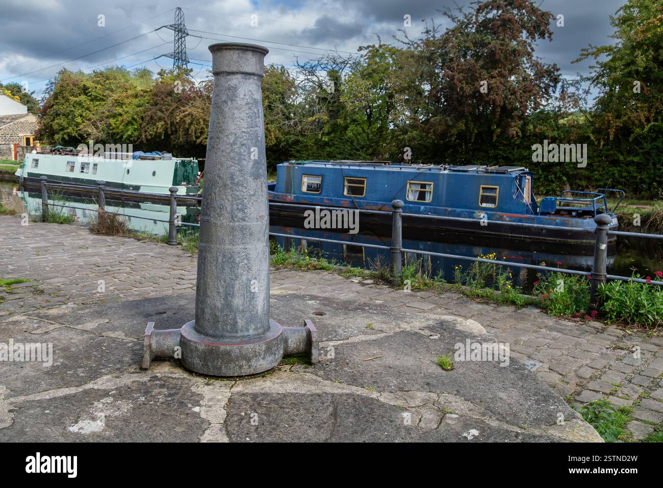 An old crane base (wharf crane base) set in stone by the Leeds ...