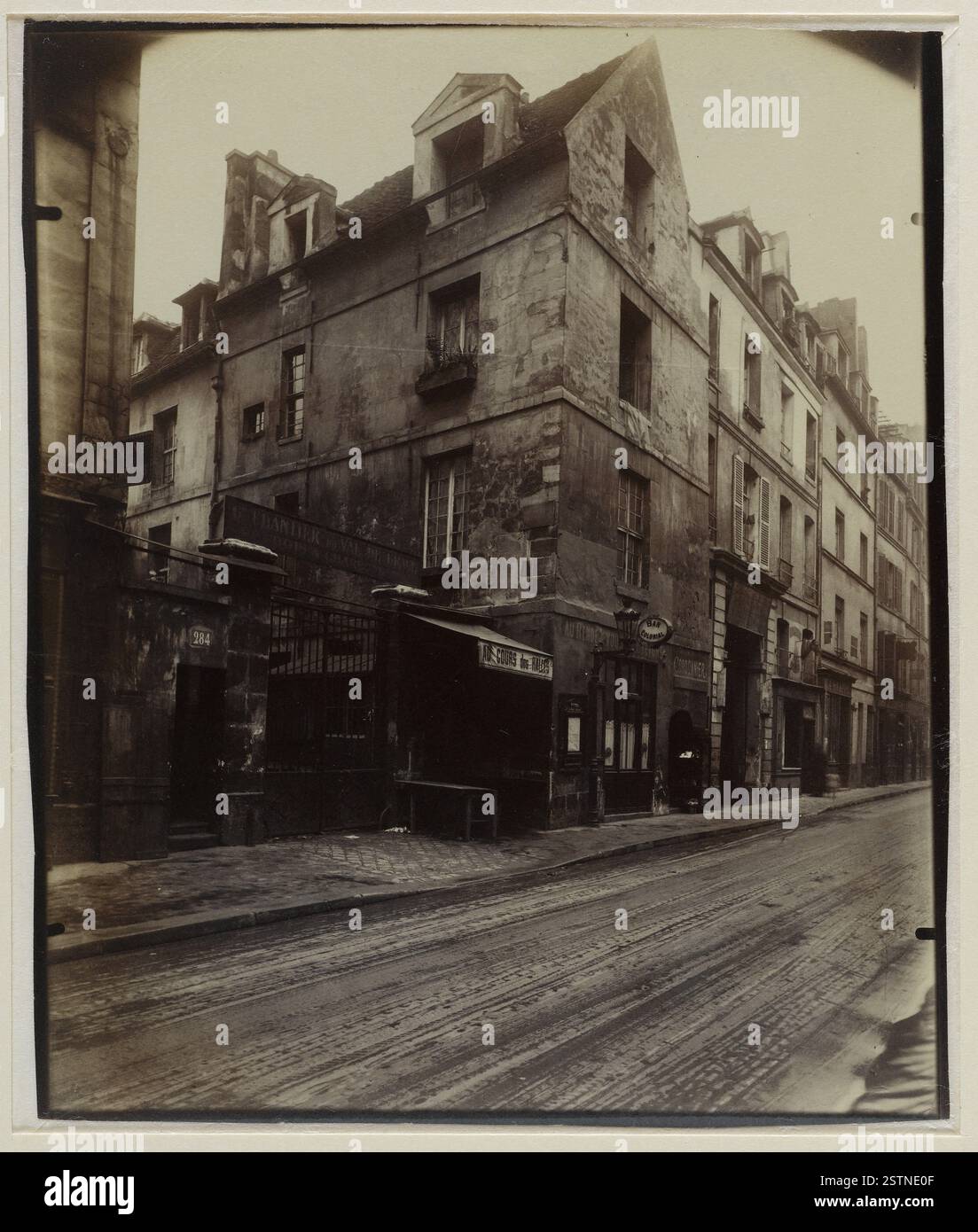 A photograph by Eugène Atget taken in 1923, documenting a picturesque ...