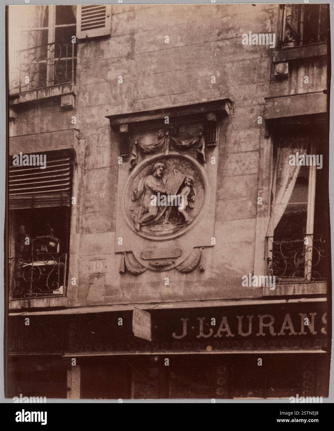 A photograph from Eugène Atget taken in 1952, depicting a vintage ...