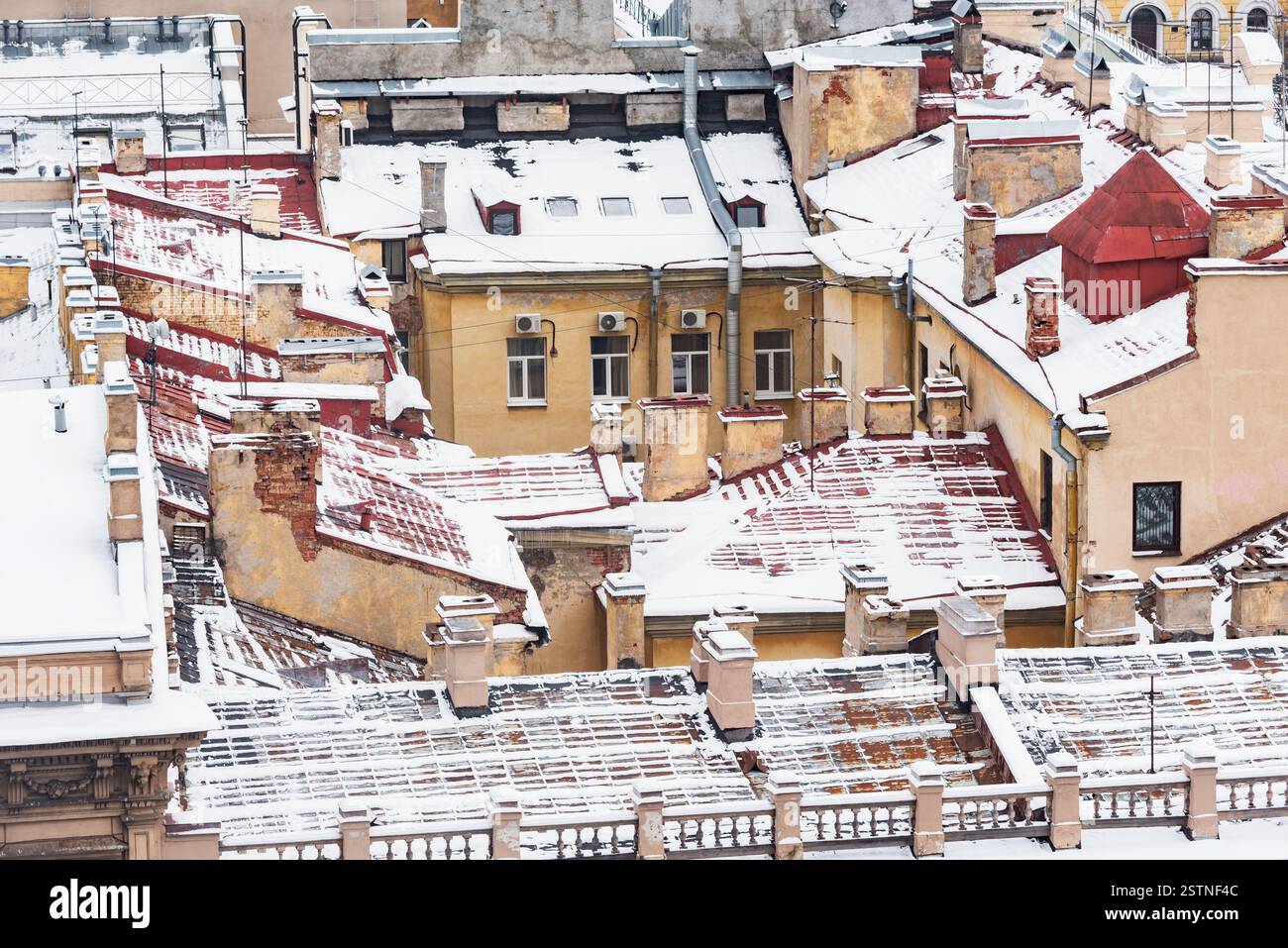 Old buildings roofs under the snow Stock Photo - Alamy