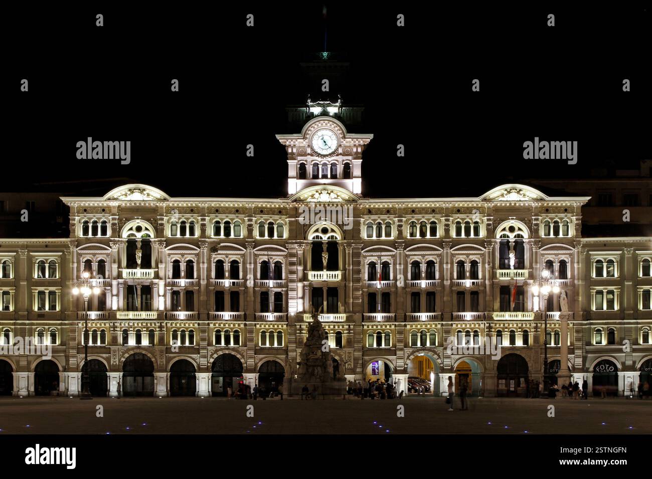 Municipality building at main square at night in trieste hi-res stock ...