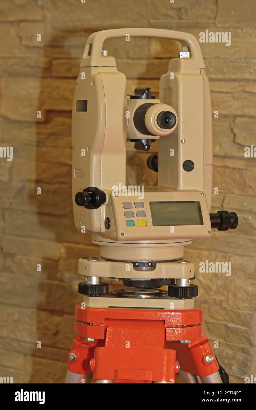 Digital theodolite surveying engineering work at construction site hi ...