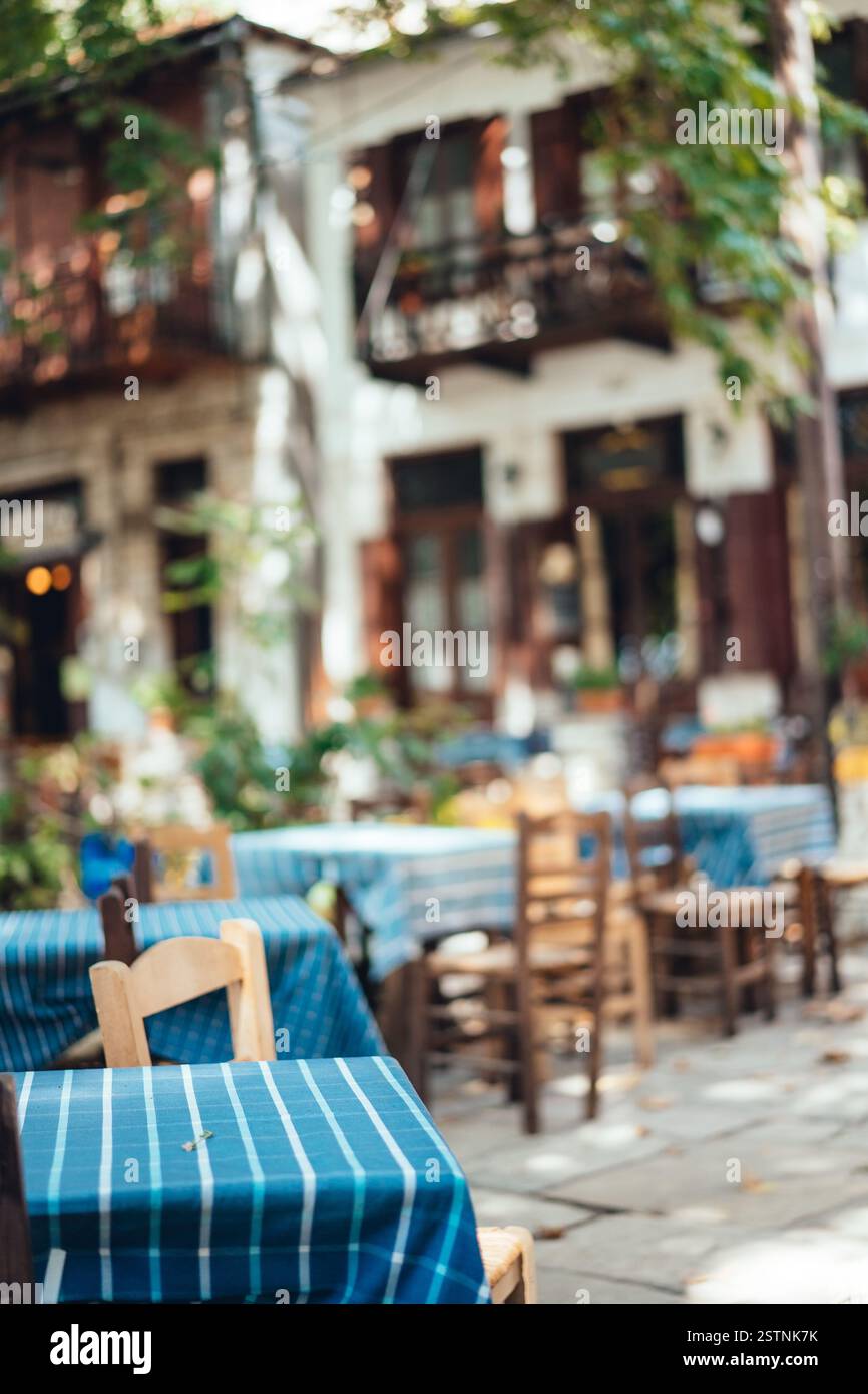 Street cafe in the narrow streets of the city Stock Photo - Alamy