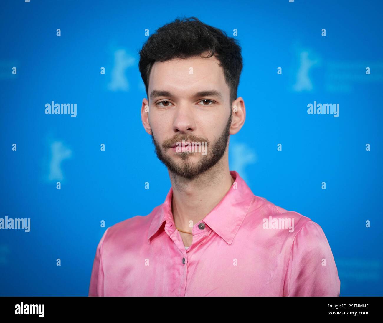 Berlin, Germany. 19th Feb, 2025. Actor Adonis Tanta stands in front of ...
