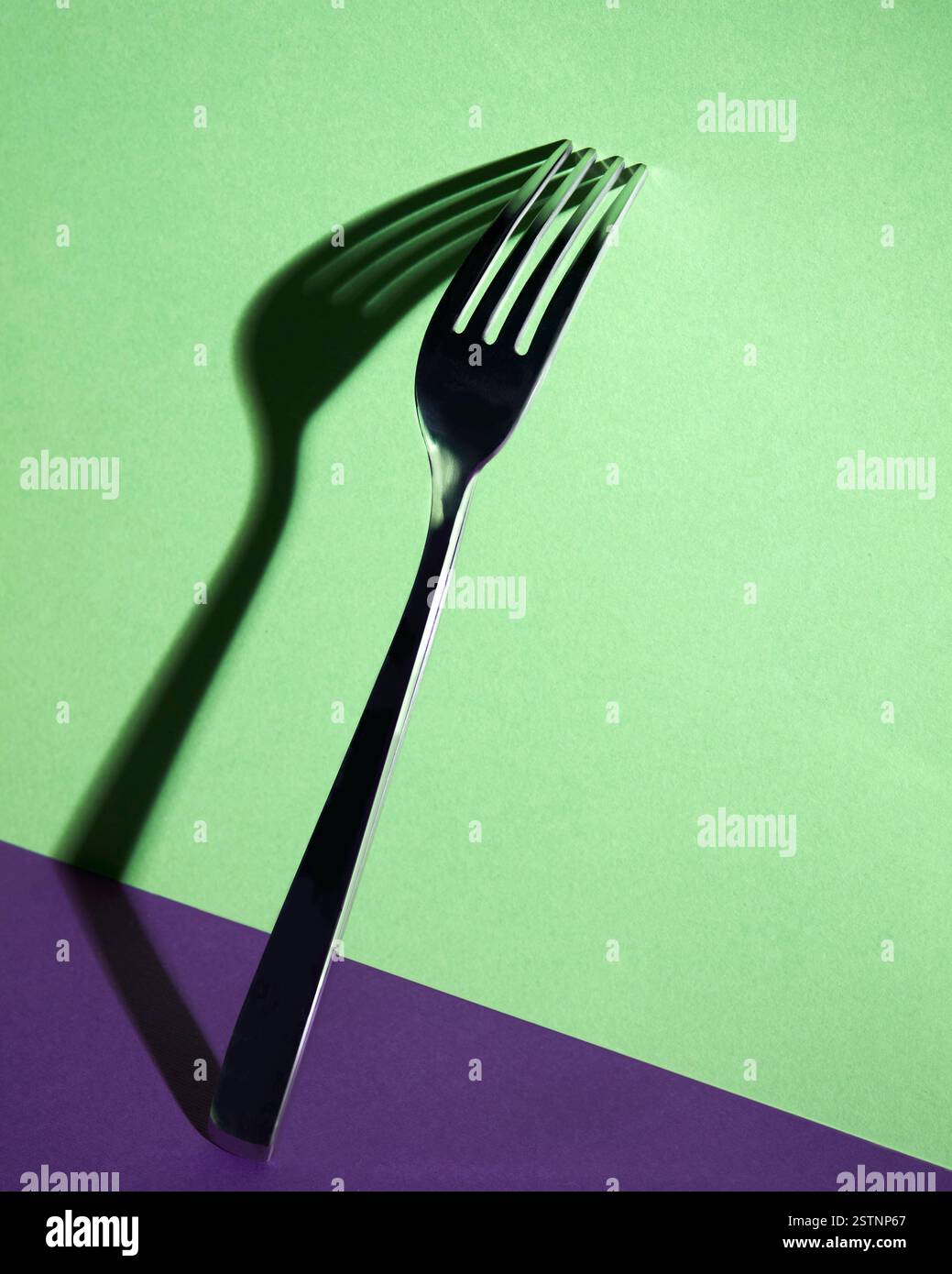 Fork on the wall,"Shadows of Simplicity Stock Photo - Alamy