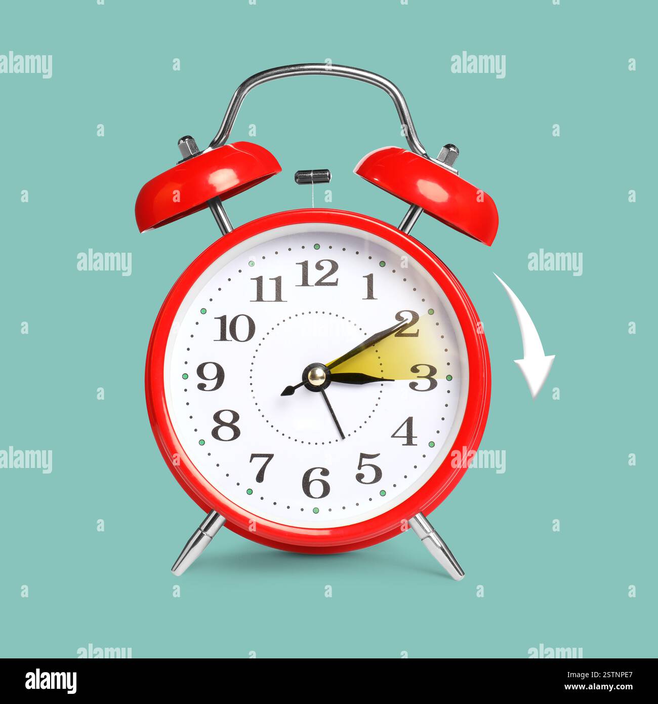 Daylight saving time. Red alarm clock on pale turquoise background ...