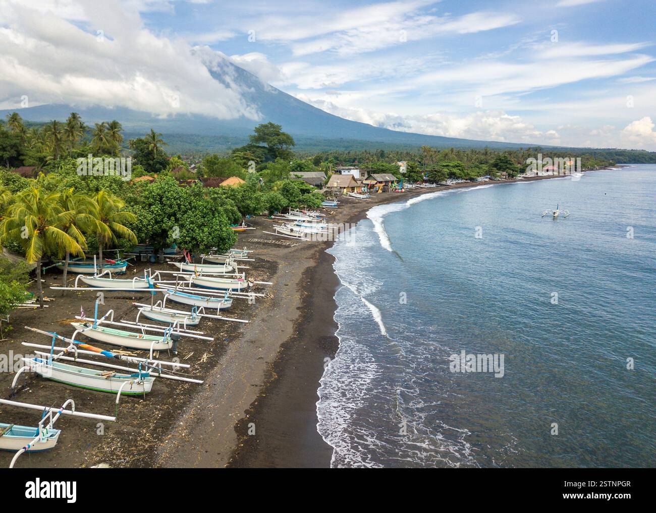 Aerial view of Amed beach in Bali, Indonesia. Traditional fishing boats ...