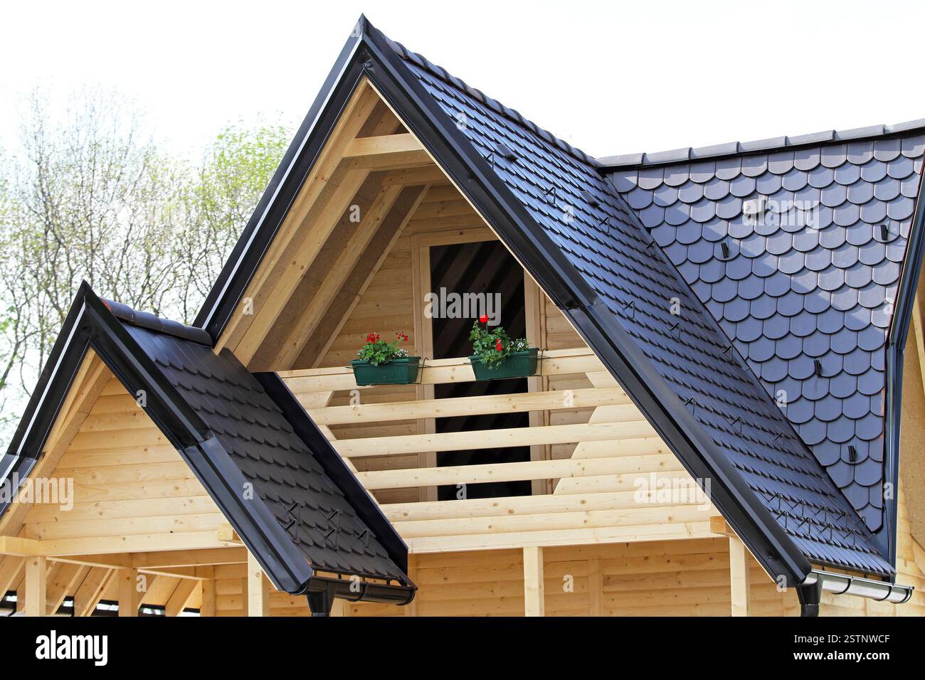 Roof balcony on retro wooden log house Stock Photo - Alamy