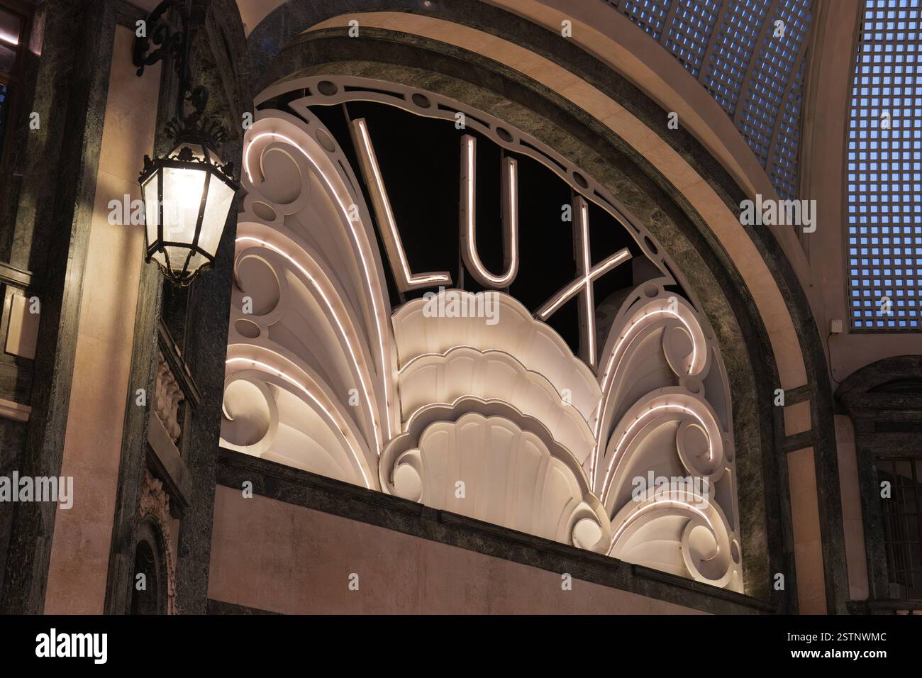 Turin, Italy. Detail of the illuminated sign of the Cinema Lux, inside Galleria San Federico ...