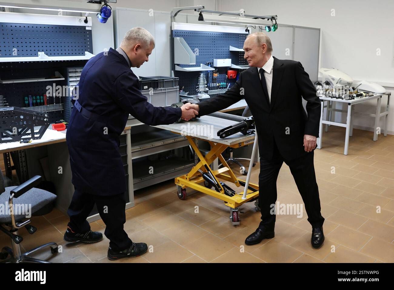 Russian President Vladimir Putin, right, visits the Radar MMS research ...