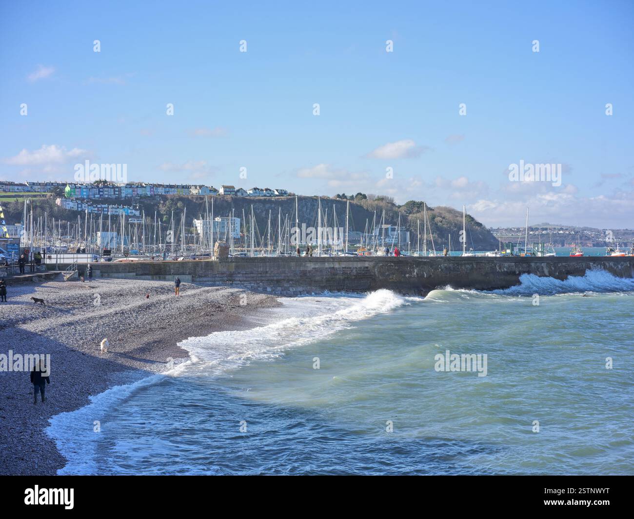 Breakwater beach, pier and harbour at Brixham fish town, Devon, England ...