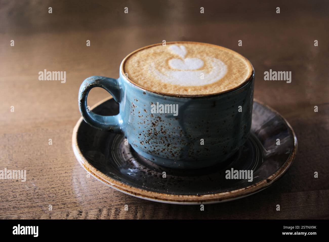 Japan style crocery Coffee cup with perfect latte art on foam side view ...