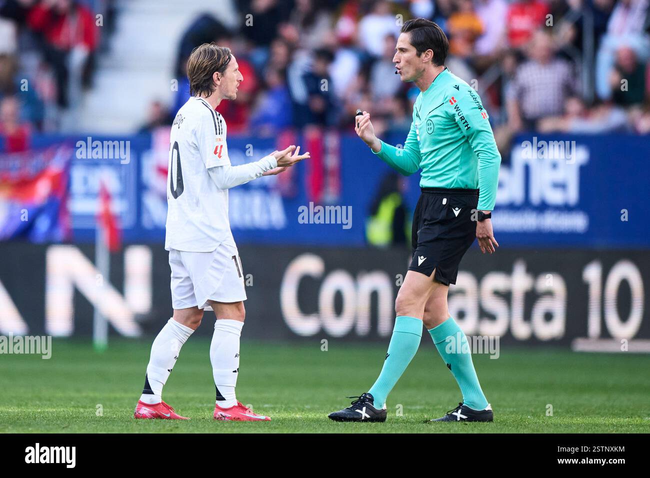 Luka Modric of Real Madrid CF in discussion with Referee Jose Luis ...