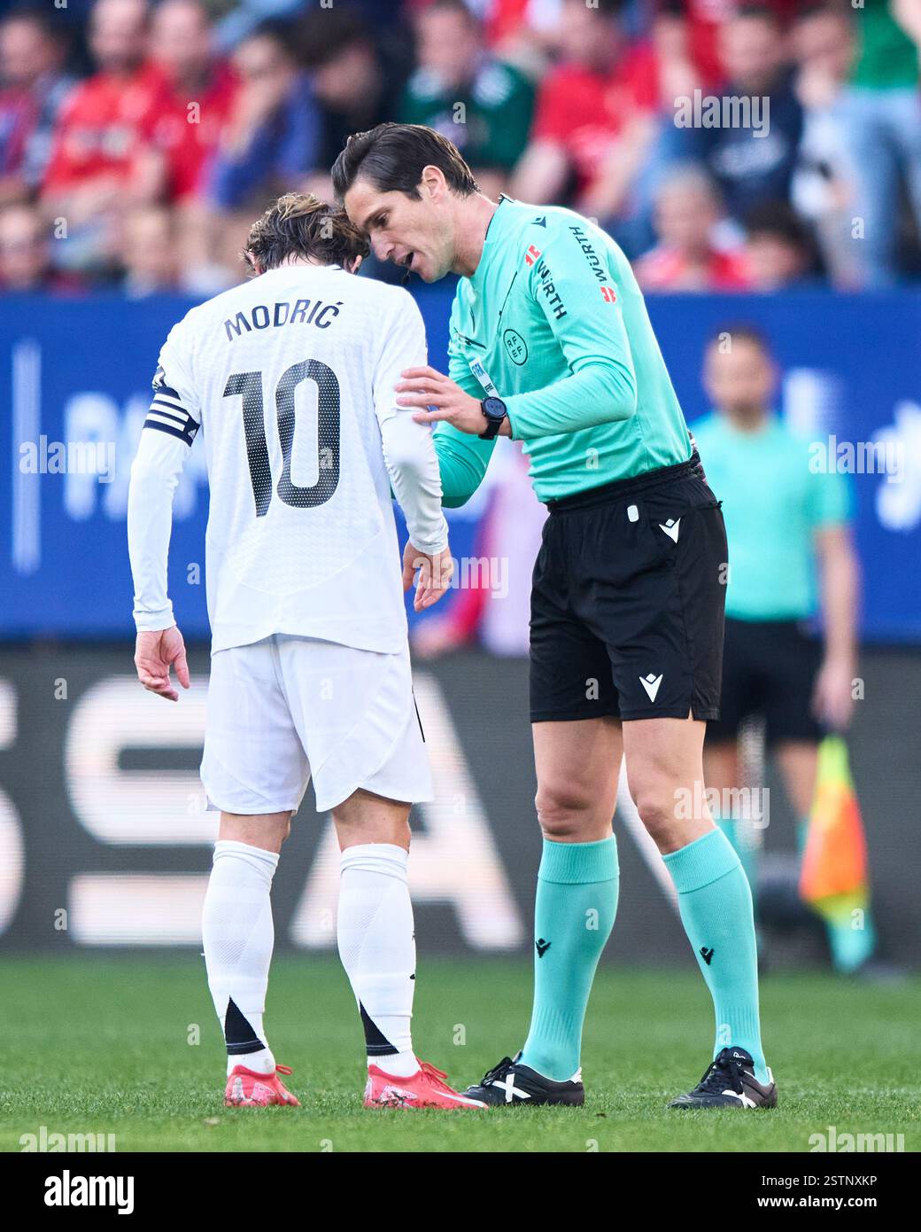 Luka Modric of Real Madrid CF in discussion with Referee Jose Luis ...