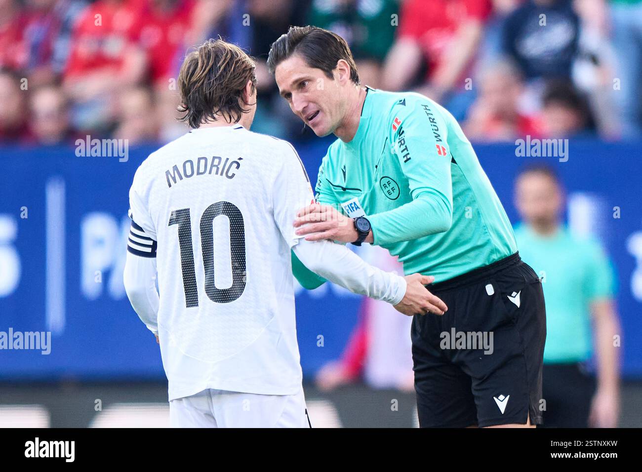 Luka Modric of Real Madrid CF in discussion with Referee Jose Luis ...