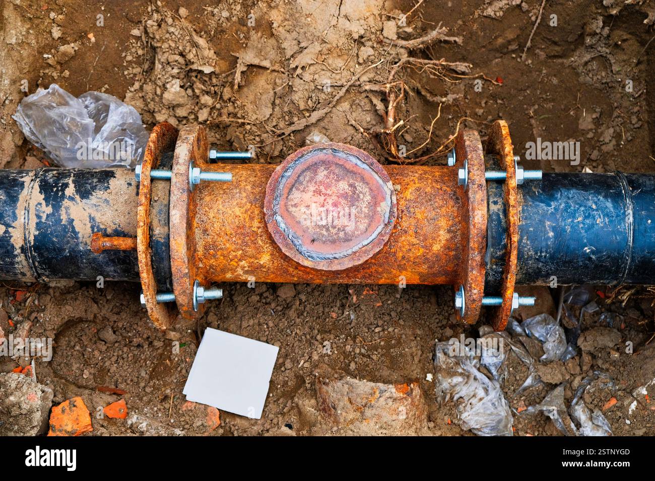 Plumbed sewage pipe. New pipes connected to old one with signs of ...