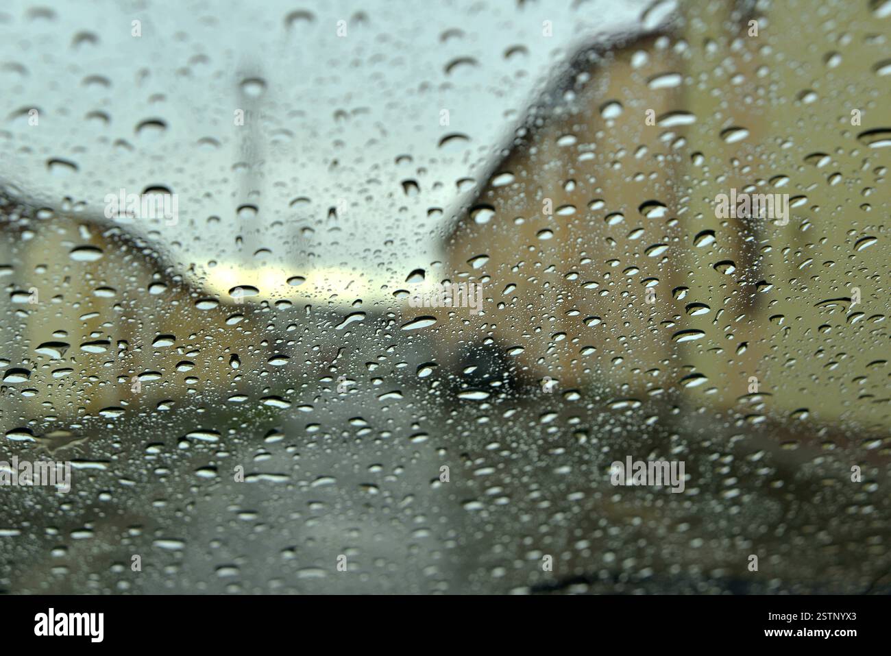 Rainwater droplets on window panes Stock Photo - Alamy