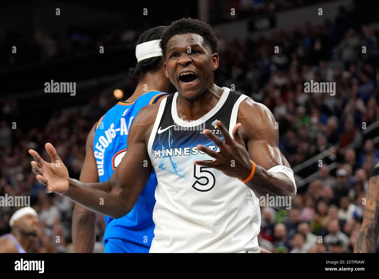 Minnesota Timberwolves guard Anthony Edwards (5) reacts toward a ...