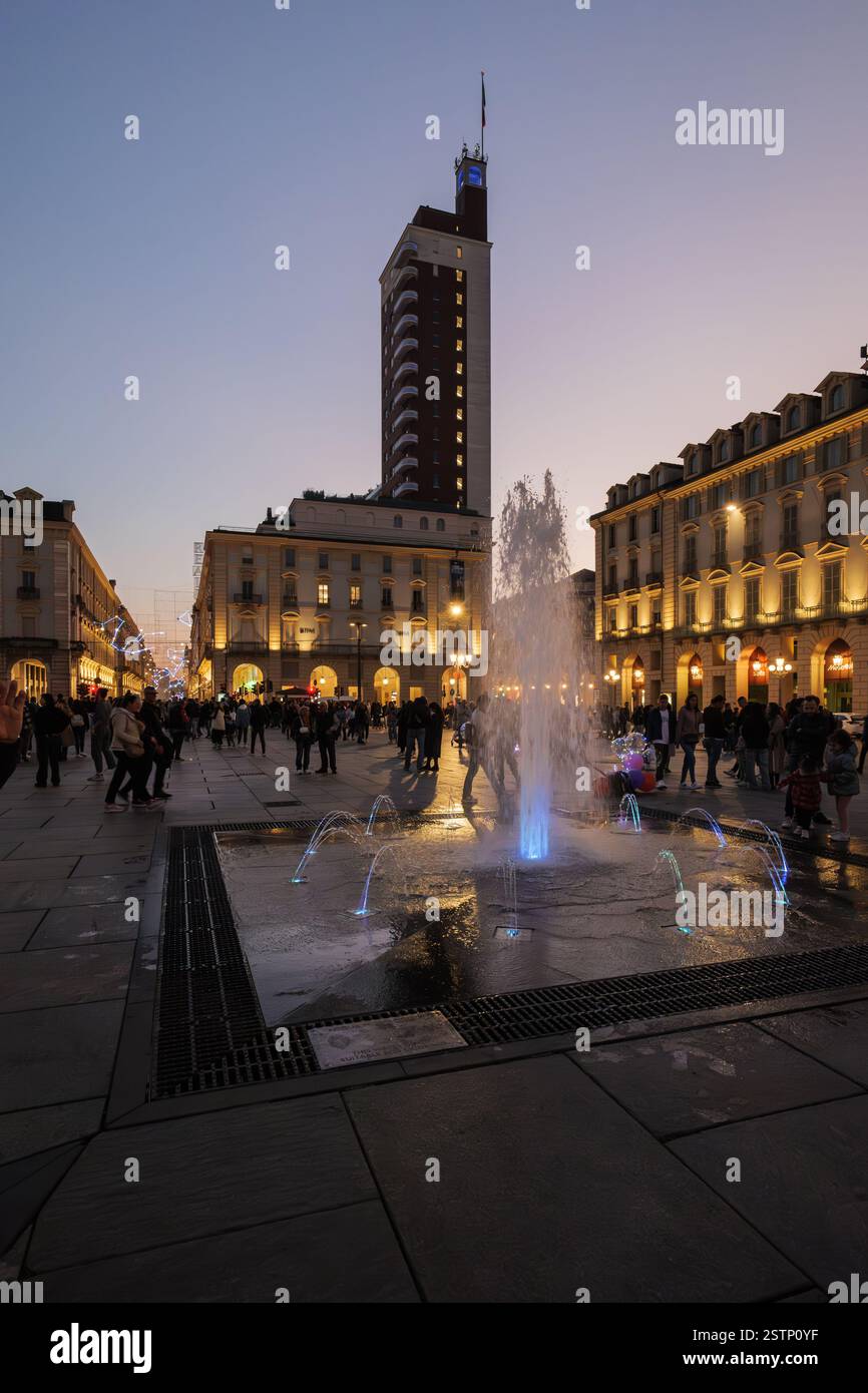Turin, Italy. Piazza Castello at night with fountains and water games ...