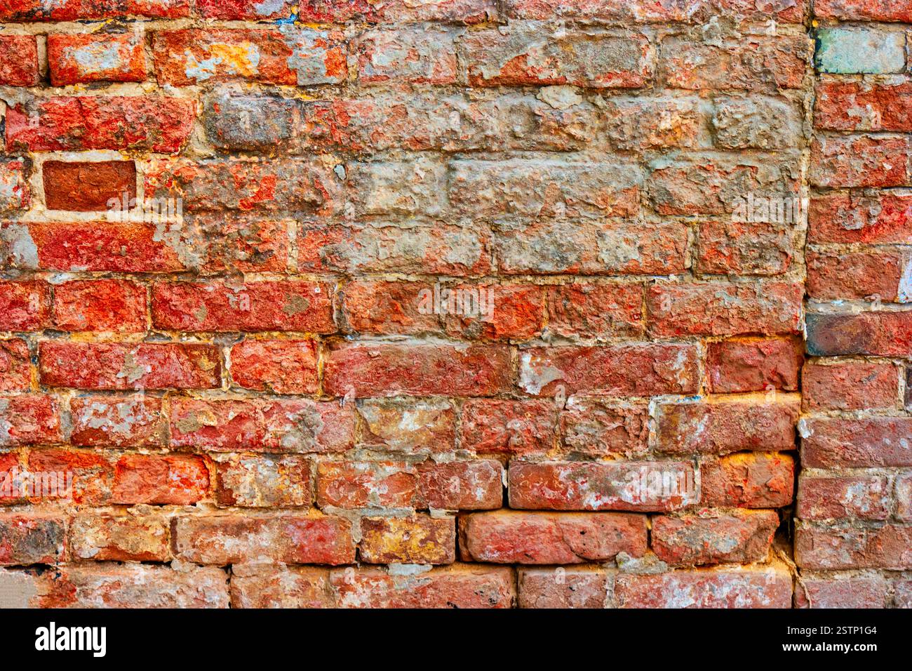 Home renovation concept. Worn red brick wall needs repair Stock Photo ...