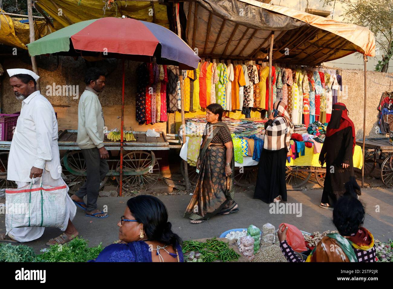 Stall selling clothing for women in the bazaar at Viayapura (Bijapur ...