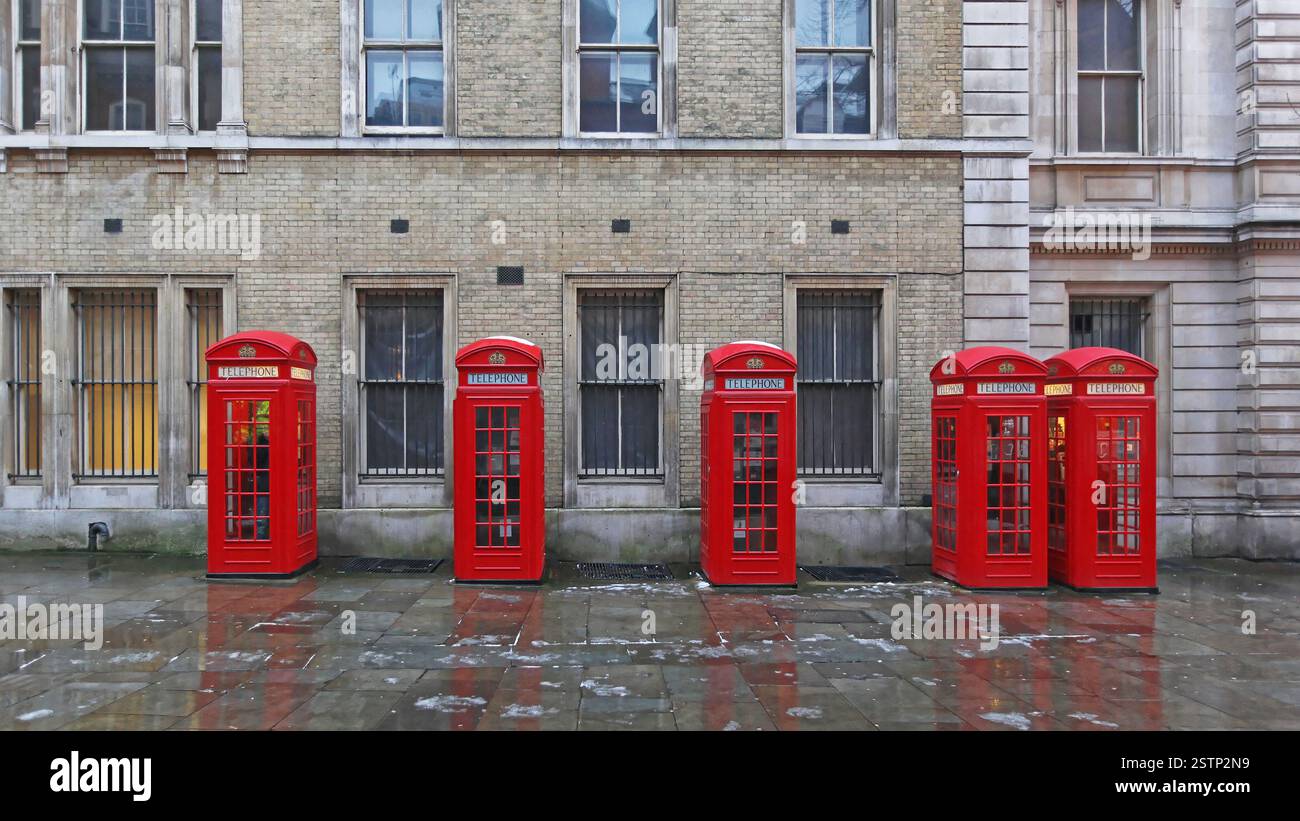 Five red telephone booths at west end in london uk hi-res stock ...