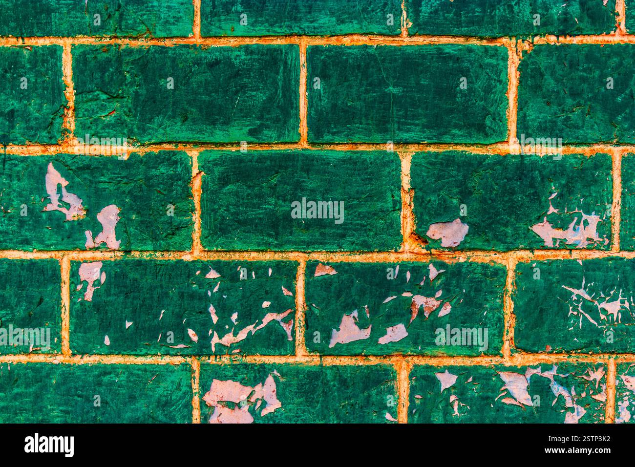 Deep green broken cracked brick wall with decorative stucco Stock Photo ...