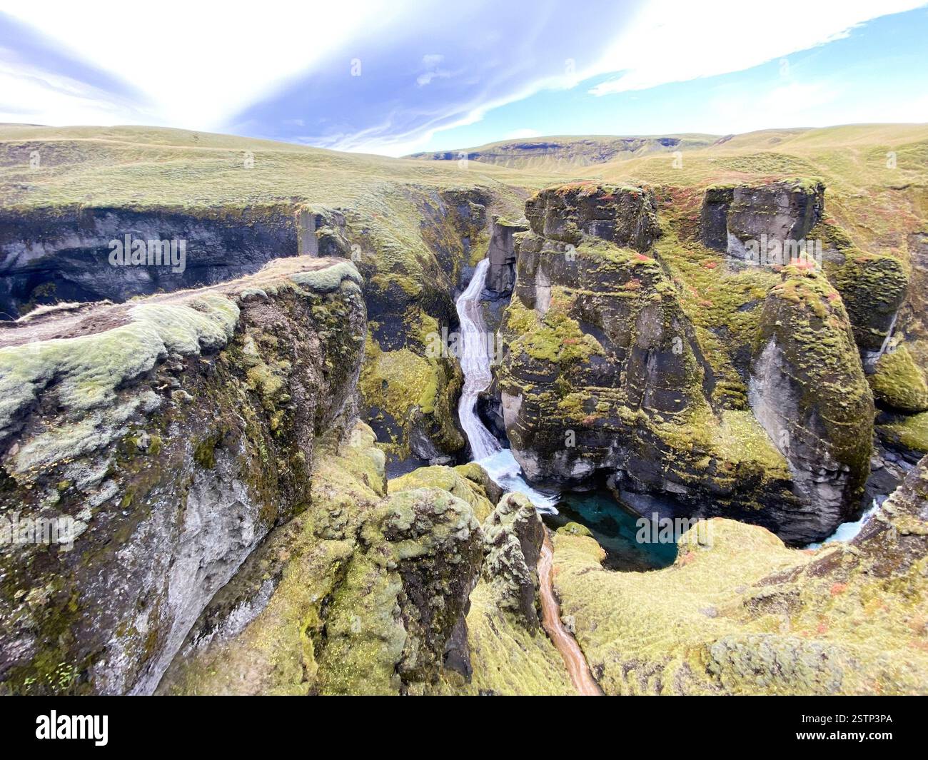 The image depicts a breathtaking landscape characterized by a dramatic ...