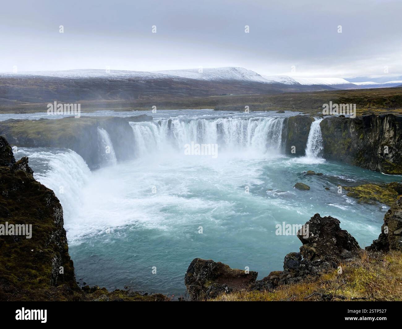 This breathtaking photograph captures the majestic Godafoss waterfall ...