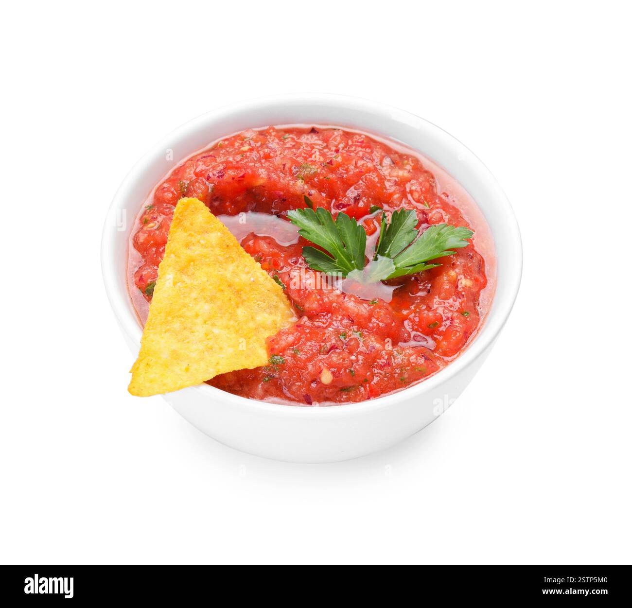 Delicious spicy salsa sauce with nacho chip in bowl isolated on white ...
