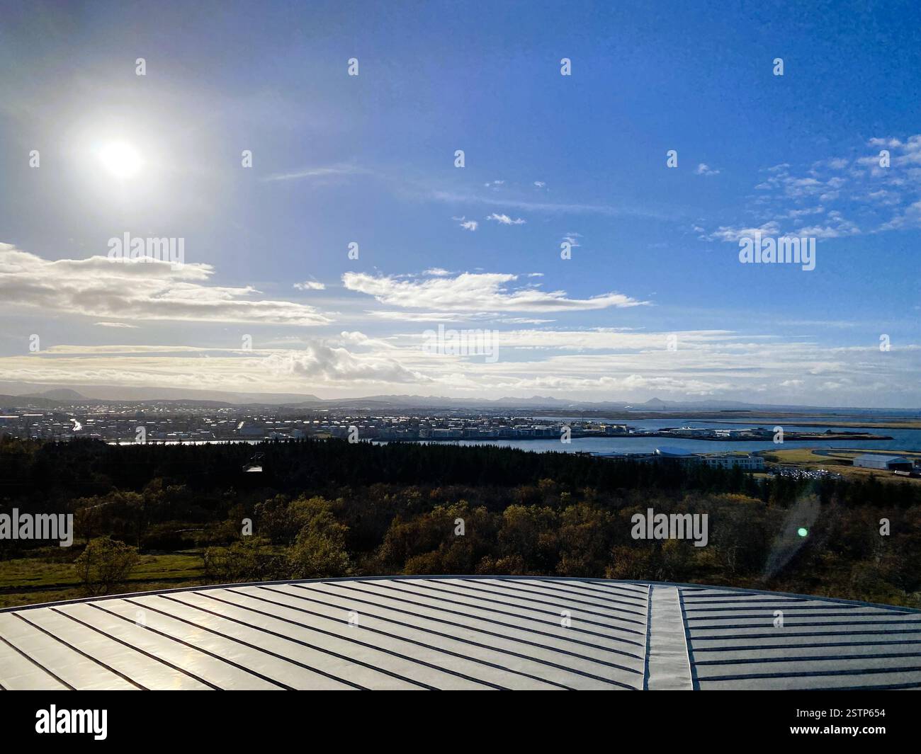 The photo captures a stunning panoramic view of a landscape under a ...