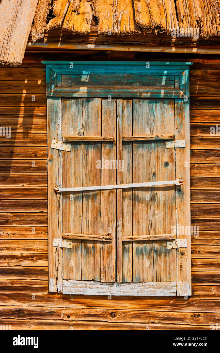 Closed shatters of wooden window made of weathered wood in Astrakhen ...