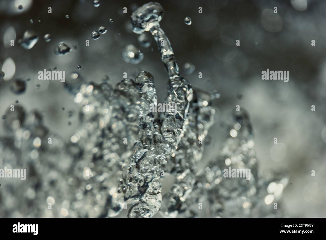 Water Splash On The Bluish Gray Background Stock Photo - Alamy