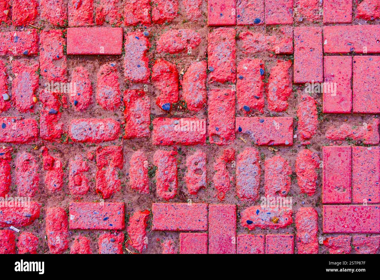 Worn footpath walk textured in red brick blocks floor above view. Red ...