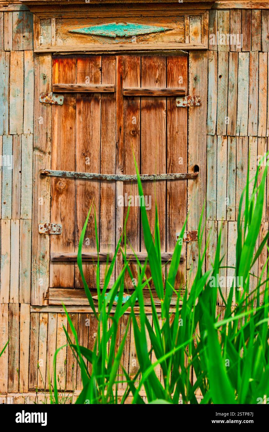 Closed wooden window of slum house front view, shanties detail Stock ...