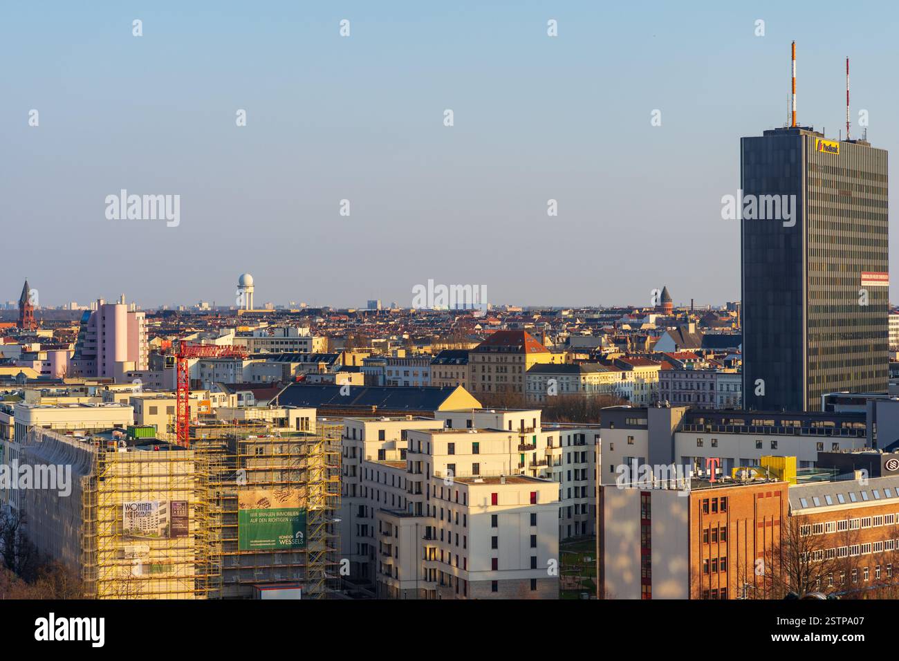 A bird's eye view of the central districts of Berlin in the evening sun ...