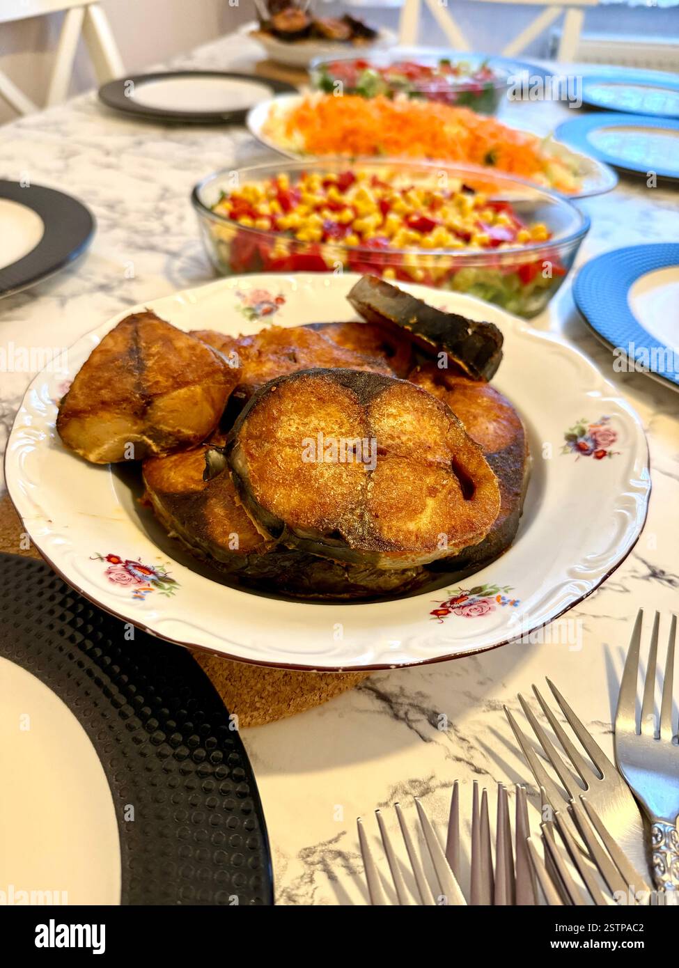 Delicious traditional Turkish fish dish bonito palamut at dinner table ...