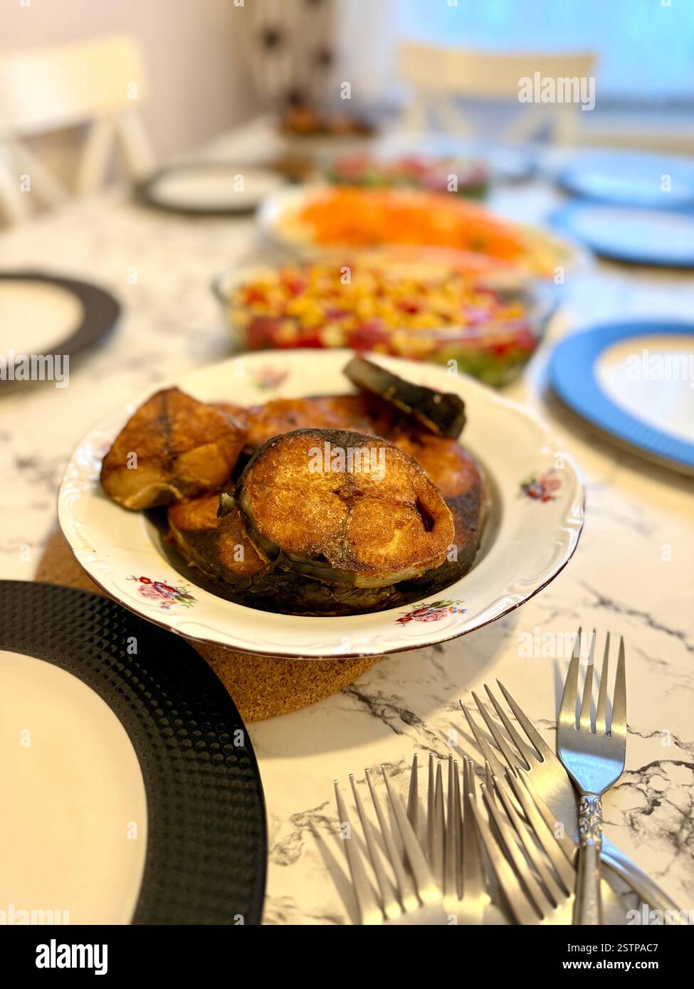 Delicious traditional Turkish fish dish bonito palamut at dinner table ...