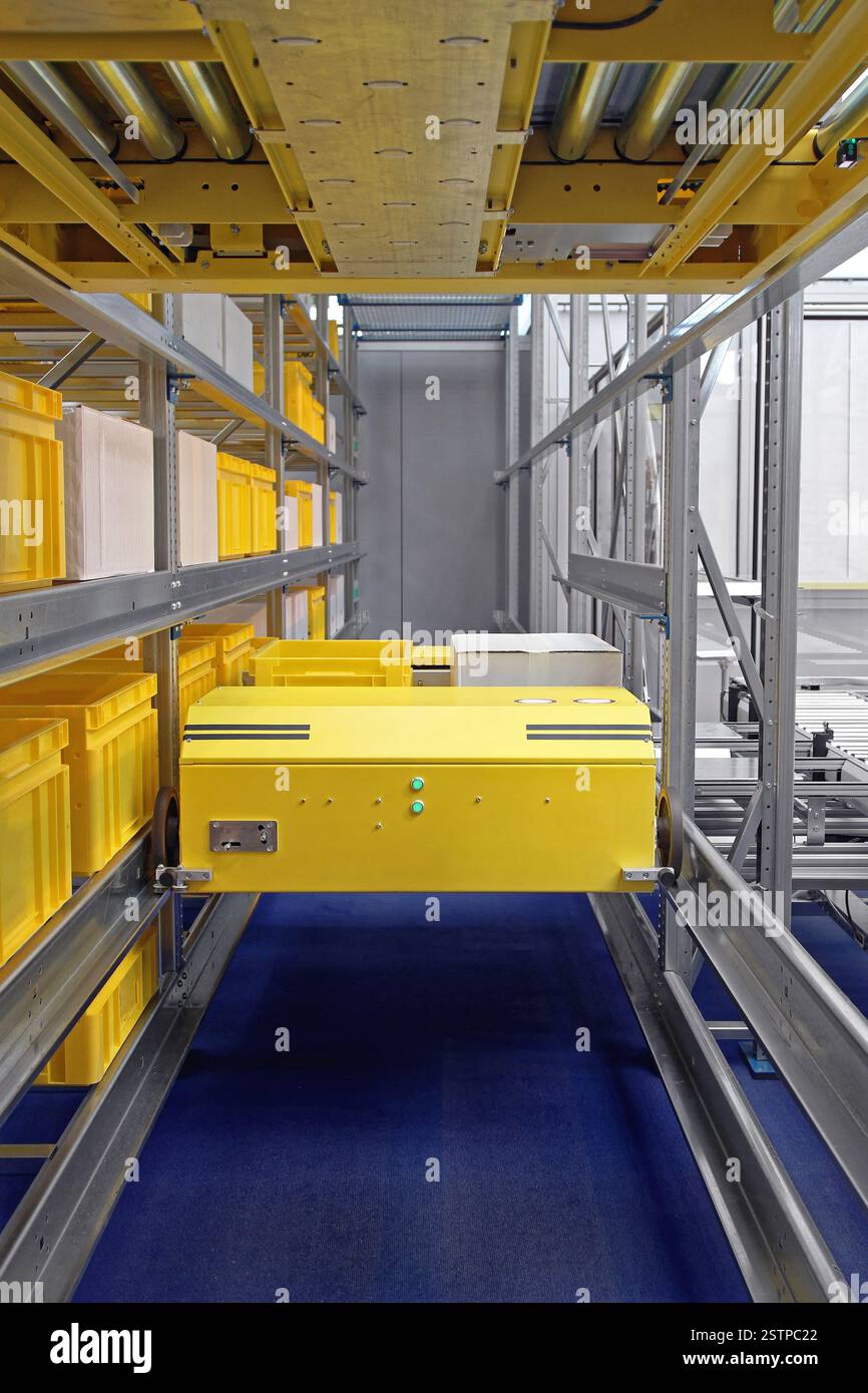 Automated pallet shuttle retrieval system in distribution warehouse hi ...