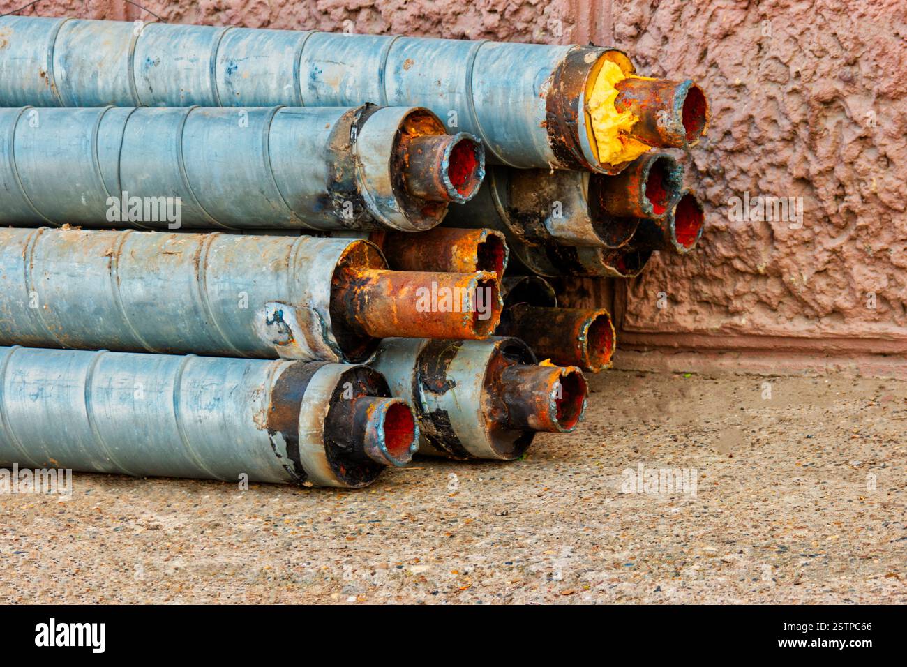 Worn hot water pipes in stack Stock Photo - Alamy