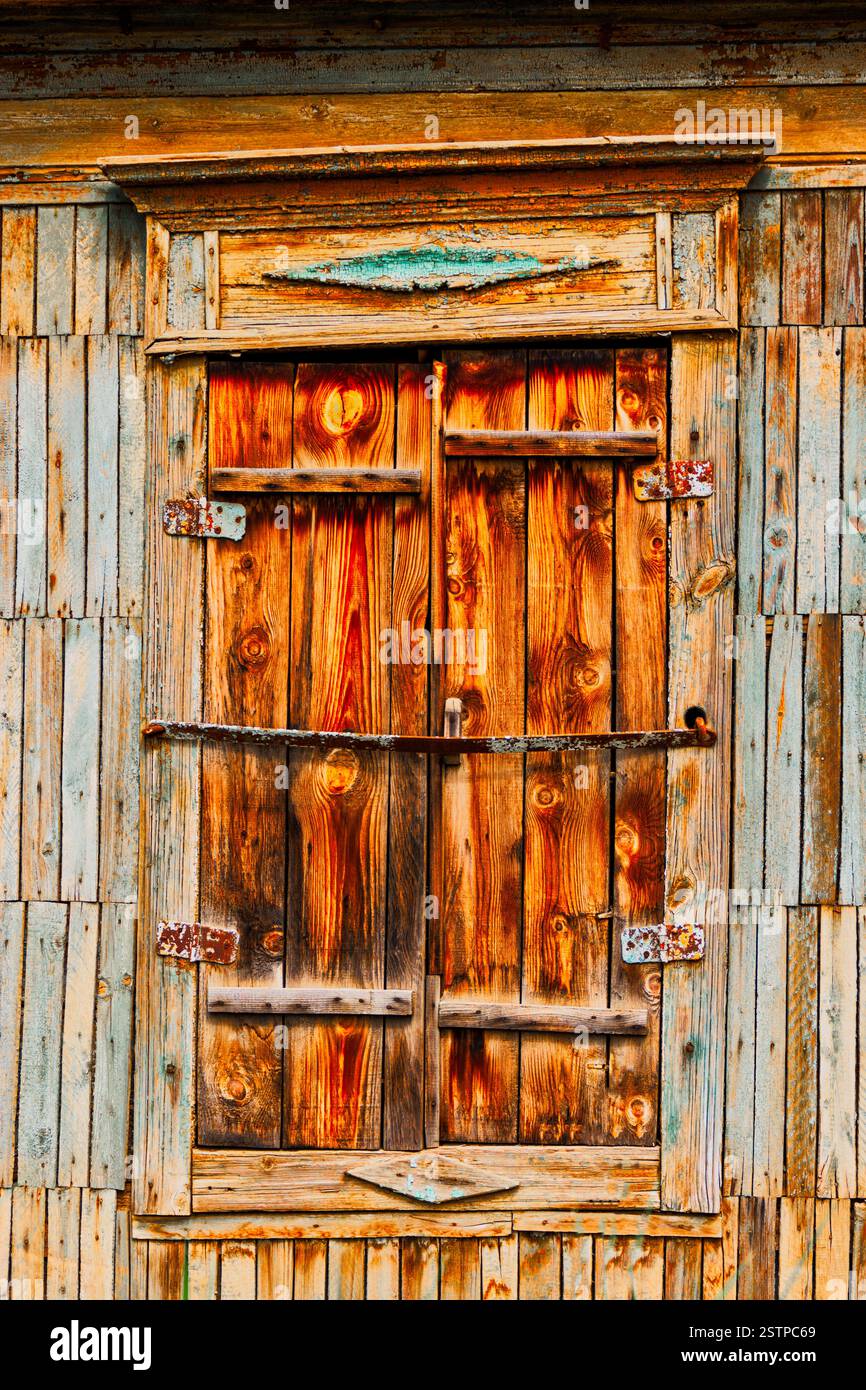 Old wooden window fron view with closed shutters Stock Photo - Alamy