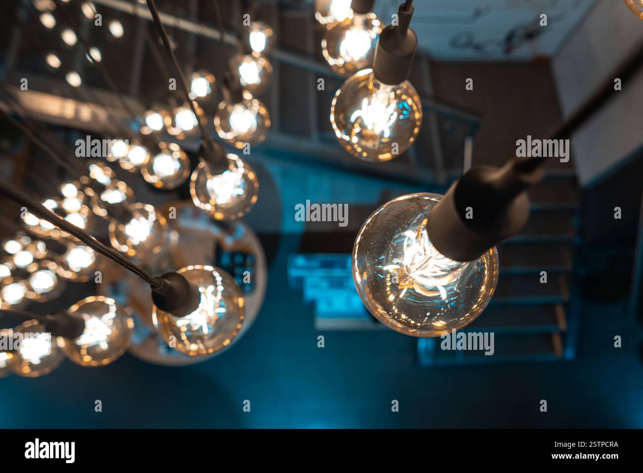 Hanging colorful light bulbs hi-res stock photography and images - Alamy