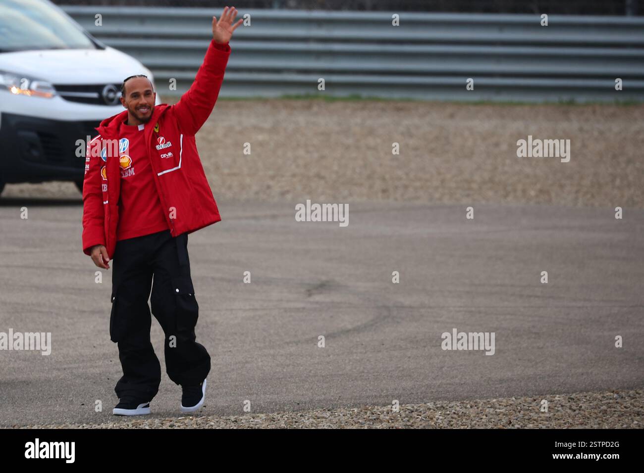 Modena, Italy. 19th Feb, 2025. Lewis Hamilton greets the fans during ...