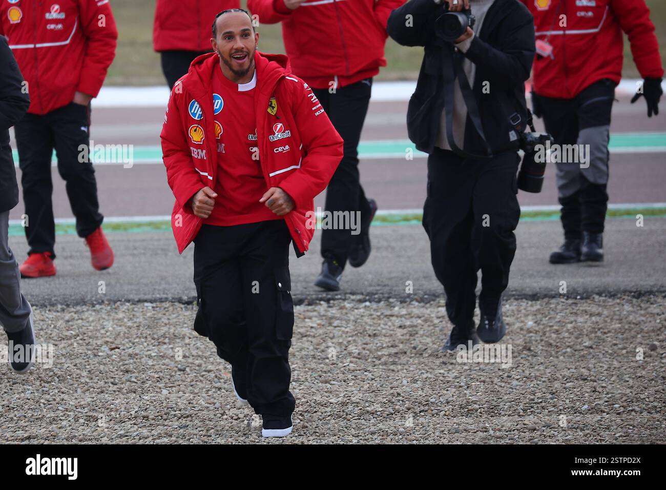 Modena, Italy. 19th Feb, 2025. Lewis Hamilton greets the fans during ...