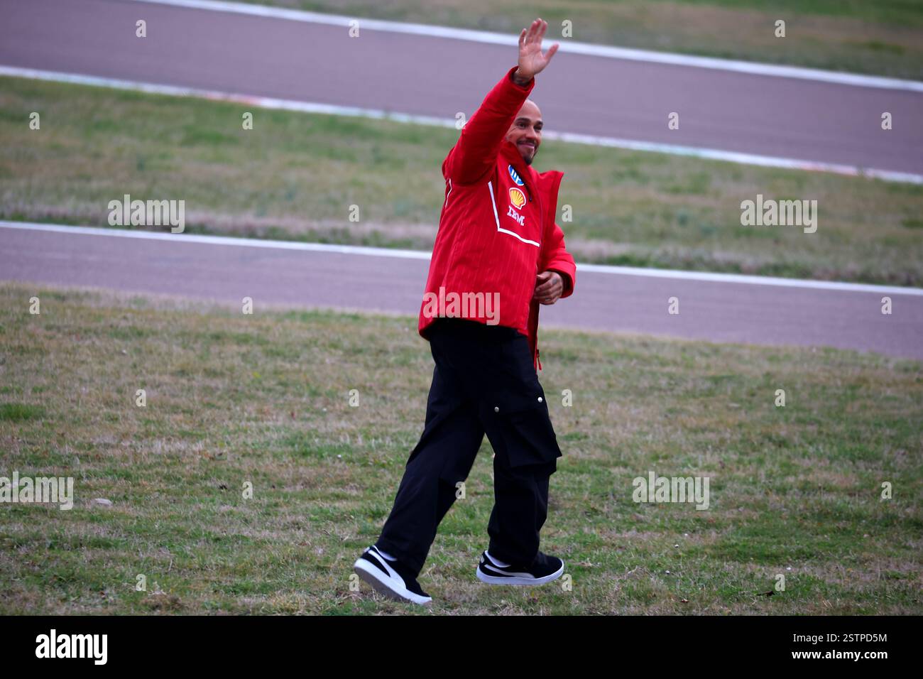 Modena, Italy. 19th Feb, 2025. Lewis Hamilton greets the fans during ...