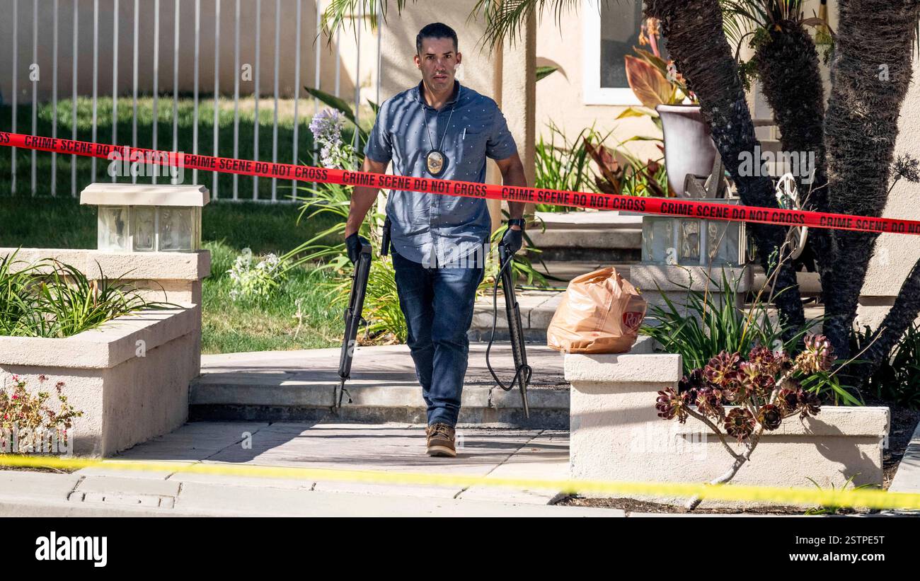 FILE - Investigators remove firearms from Judge Jeffrey Ferguson's ...